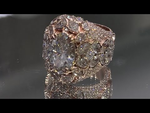 Watch us make this STUNNING 5 carat Oval Cut Diamond Ring! Beautifully installed in flower pear cut.