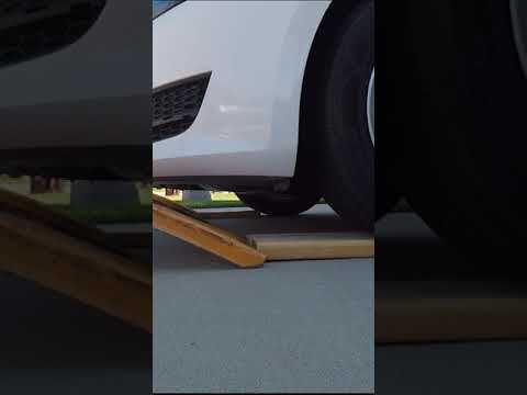 How to drive a low profile car up a ramp.