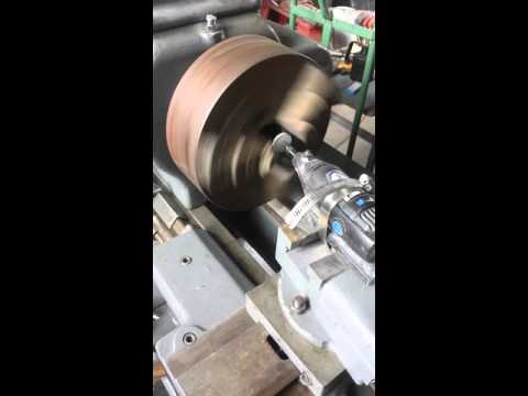 Grinding jaws on 13 inch LeBlond lathe.