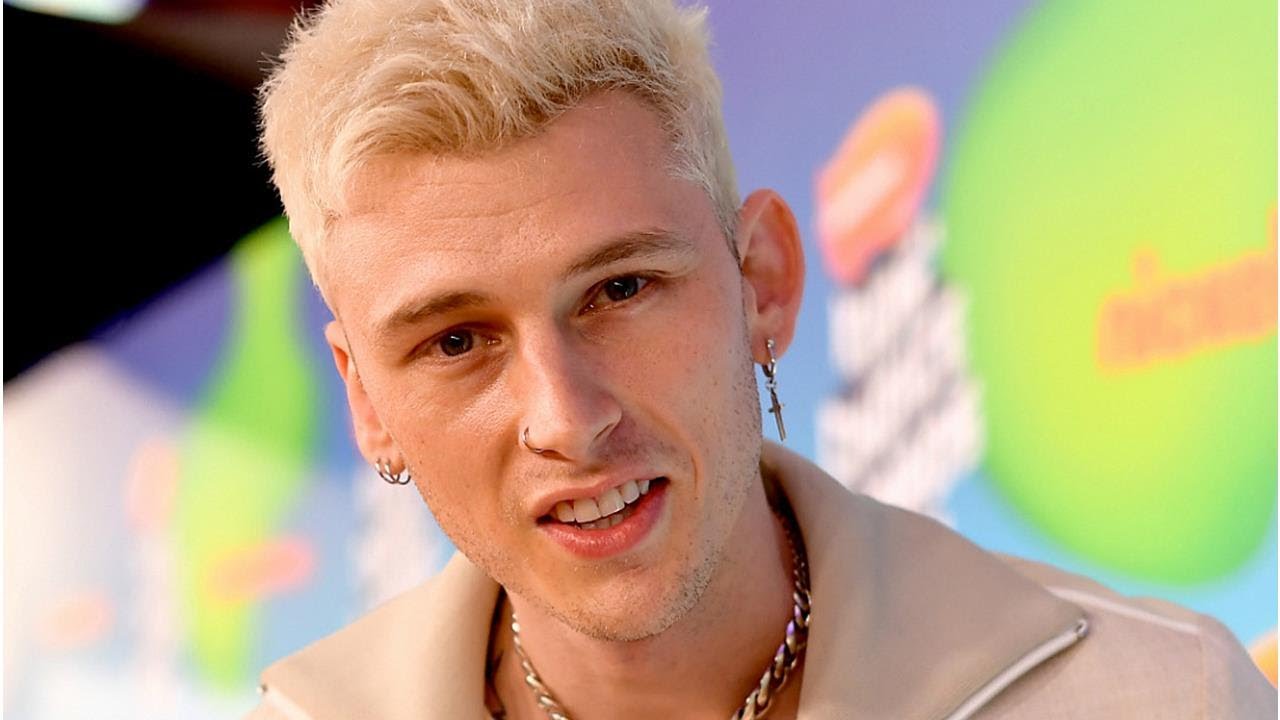 chsMachine Gun Kelly Unveils New Vampire Bite Tattoo on His Neck