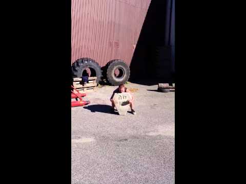 Strongman 100kg stone