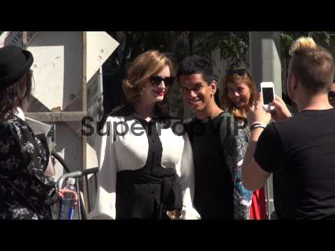 Christina Hendricks with fans at Spring 2014 Mercedes-Ben...
