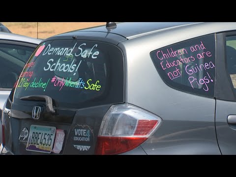 Educators pack in cars in Mesa to protest reopening schools plan
