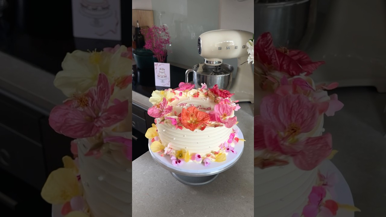 summery wedding cake with edible flowers 🌺🌼💐 #cakedecorating