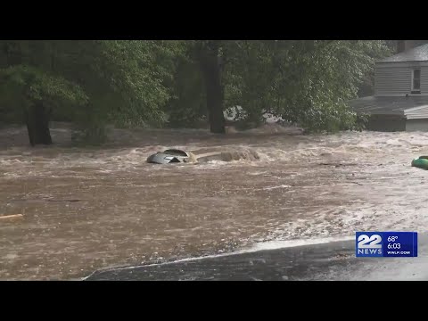 Two people missing in Connecticut after being swept away in flood waters