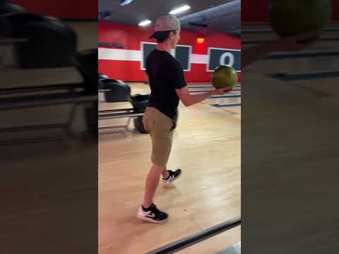 Guy is being silly and says he's dribbling bowling balls.