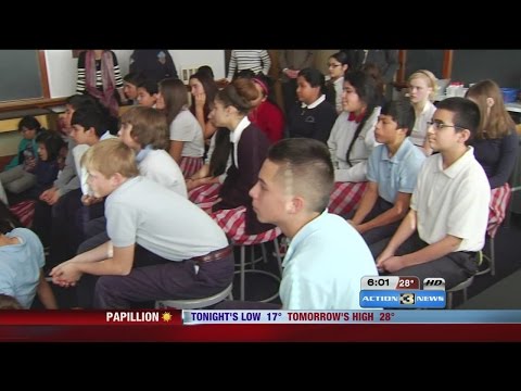 Students watch as Cupich is installed as Archbishop of Chicago