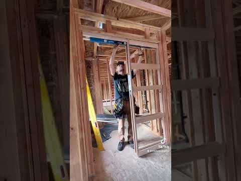 Setting pocket doors.