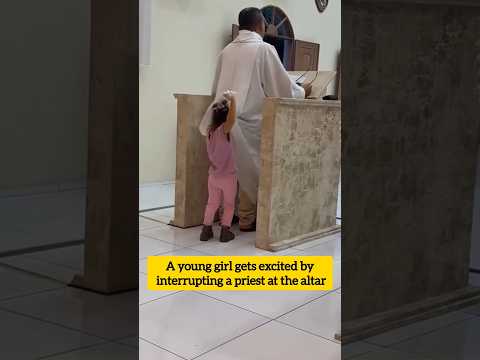 A funny moment of a young girl excitedly interrupting priest at the altar #priest #father #reverend