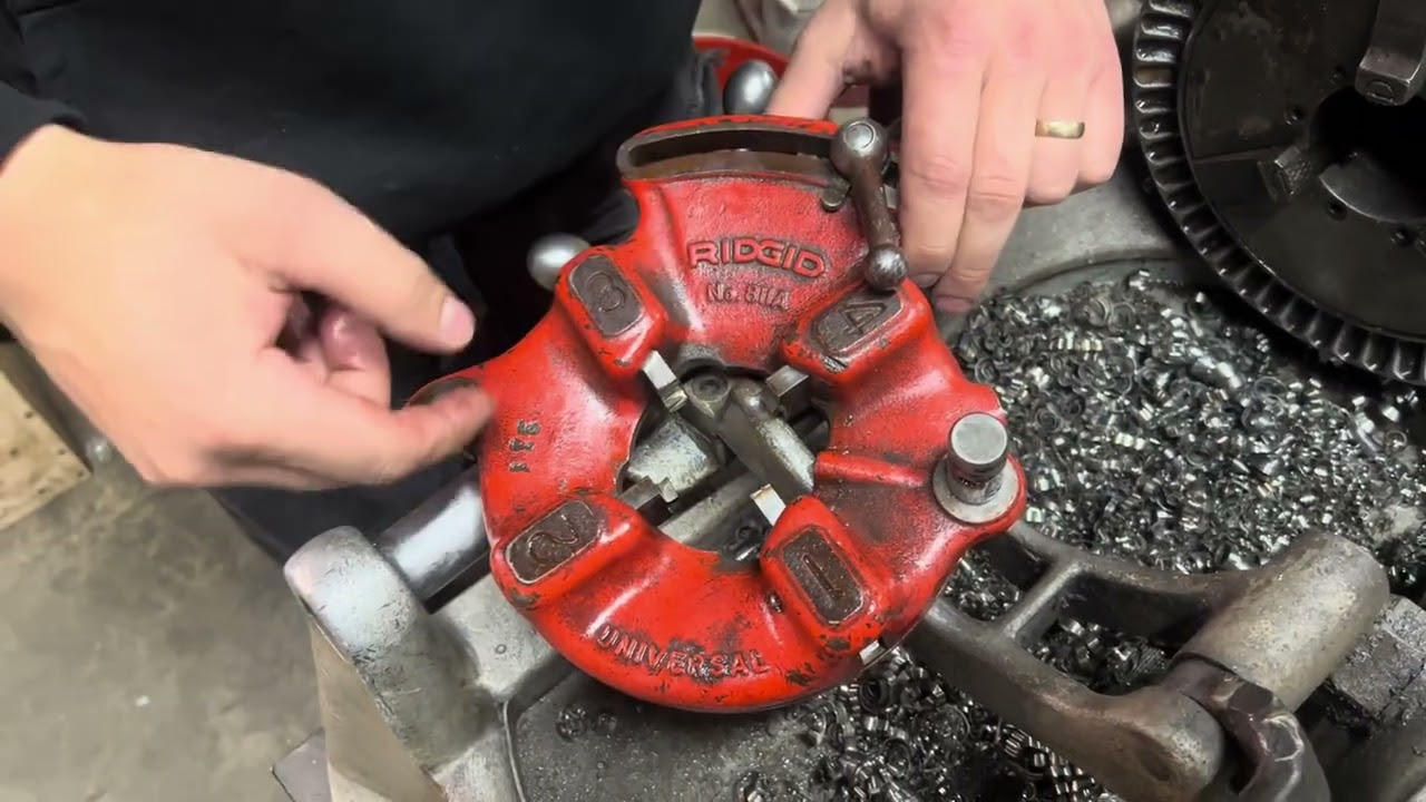 Inserting dies into ridged pipe threading head - Royal Machine Solutions