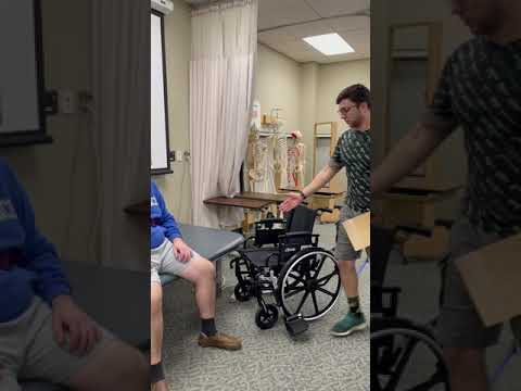 (Lock the wheels) Sliding board transfer