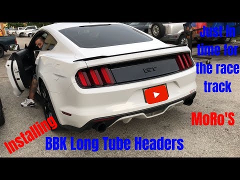 BBK long tube headers being installed on JR's Mustang GT. Loudf as F**k and race track meet