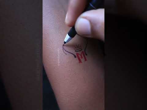 M letter with wings tattoo #shorts