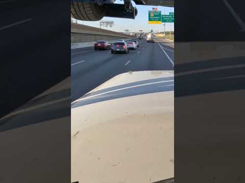 Stalled vehicle in the middle of the freeway