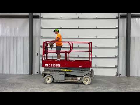 MEC 2033ES electric scissor lift - Schneider Auctioneers LLC