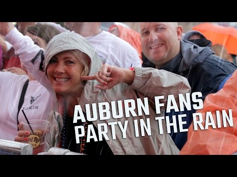 Auburn fans party in torrential downpour in New Orleans