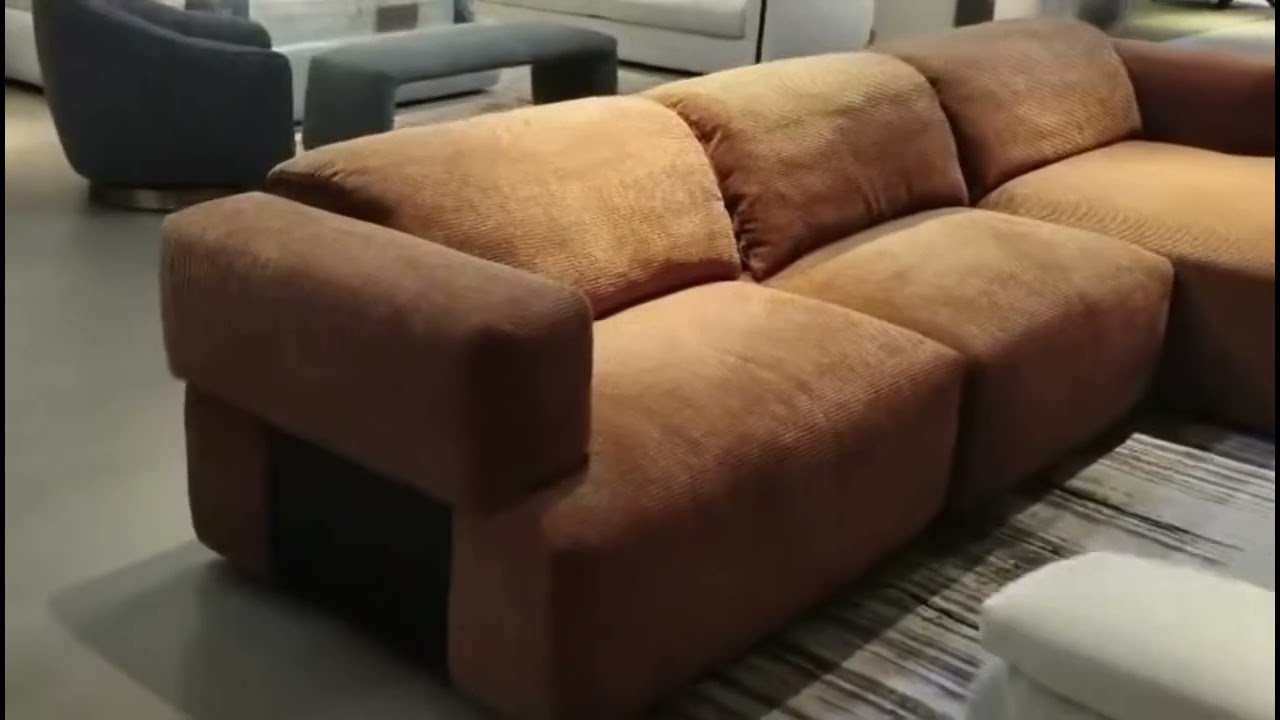 Upholstered sofas blend sophisticated aesthetics with everyday durability