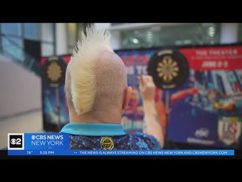 Meet "Snakebite," a double world champion professional dart player