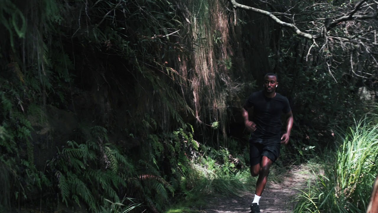 HEALTHY Man Running Through Forest - HD 4K HIGHEST QUALITY Stock Footage