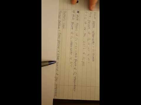 Calculating the partial pressure of oxygen in a diving gas tank at 100 m water depth (10.71)