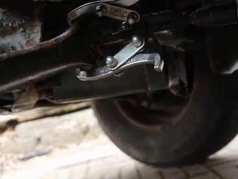 Removing the control arm bushing with a pulley puller (part 4)