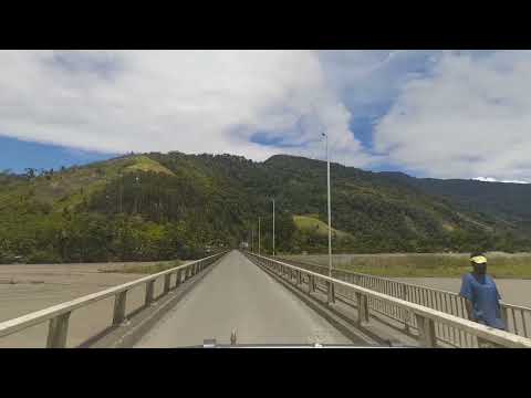 Crossing Markham Bridge, the longest single lane bridge in PNG.
