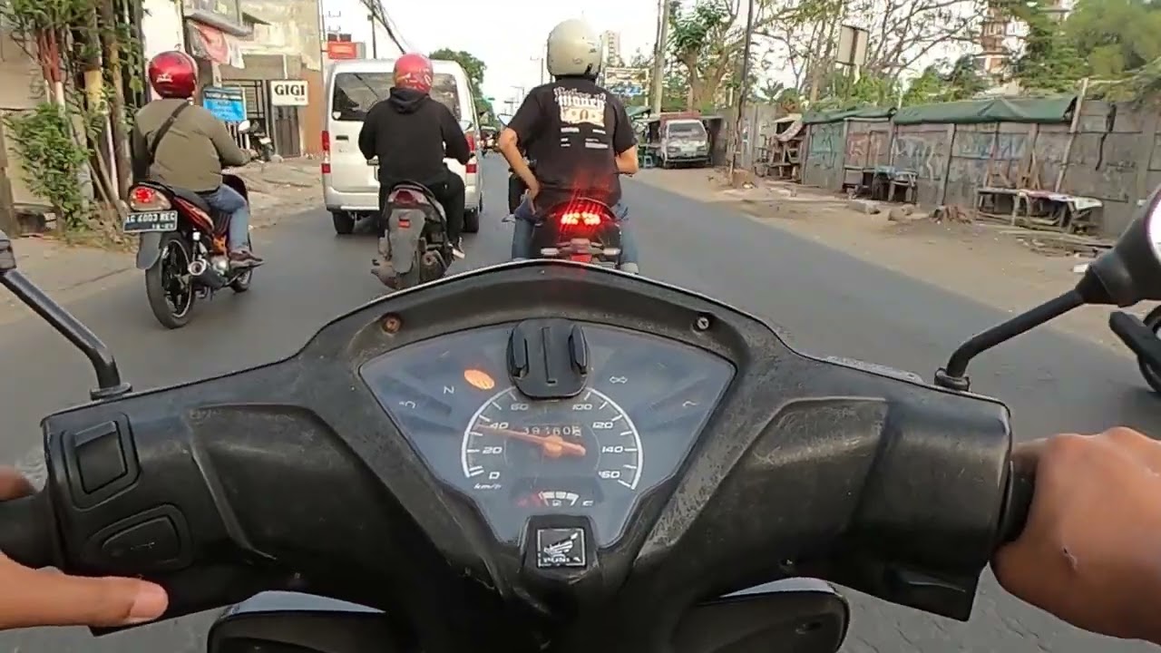 Afternoon city traffic of southern area of Surabaya, East Java, Indonesia