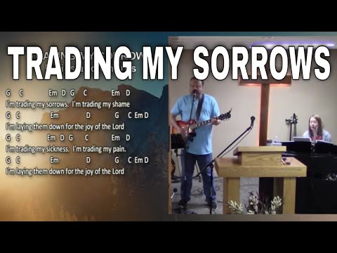 Trading My Sorrows - Praise and worship song with lyrics and chords