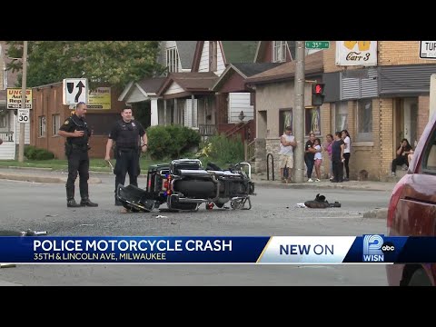 Driver collides with MPD motorcycle officer