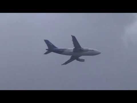 Air Transat A310 C-GTSH On TS206 Flying Over Stockport Heading To Manchester Airport On 13/05/2014