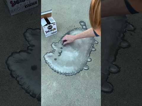 Attempting to draw pusheen cat as a helium balloon… with sidewalk chalk! #chalkart #pusheen
