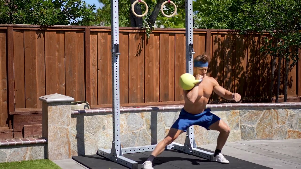 Single Arm Kettlebell Rack Cossack Lunge