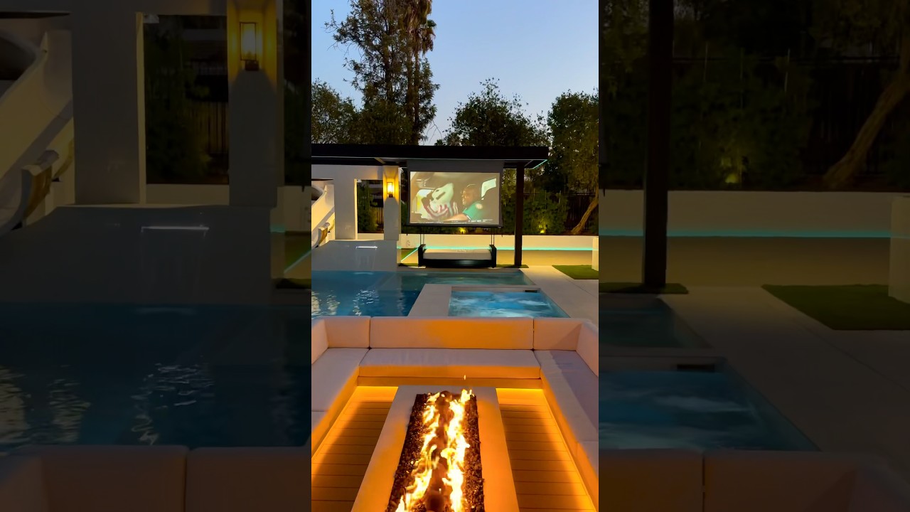 Every backyard needs this! 🤩 #backyard #pool #projector #poolslide #home