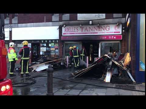 Fire crews at scene of Bilston sun bed shop blaze