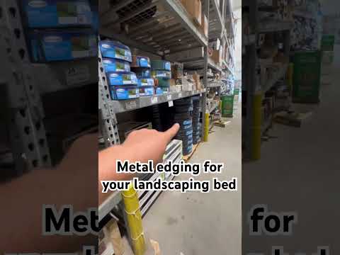 How to install edging on landscaping bed. Metal edging is a must for rock beds.