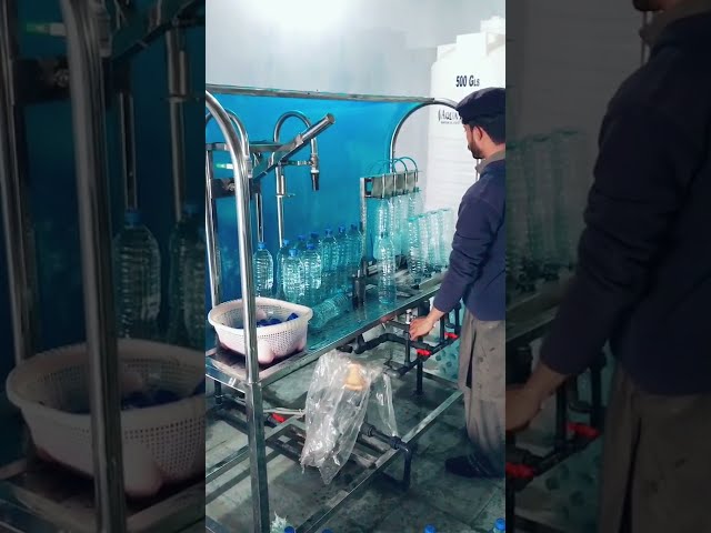 Water Bottle Packing Machine - Mineral Water Packing Machine Manufacturer from Ahmedabad