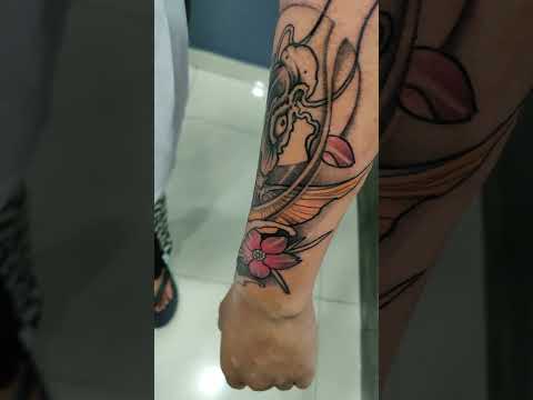 Japanese Koi Fish Tattoo 🐟 #koi #koifish #japanesetattoo #flowers #tattooideas #traditionaltattoo