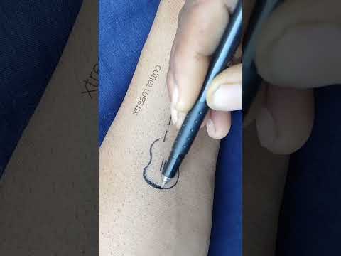 How to make guitar tattoo with music key 🔑🎸#shorts #tattoo #viral