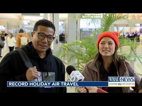 Big crowds at RDU for busy air travel day, nearly 100 delayed flights