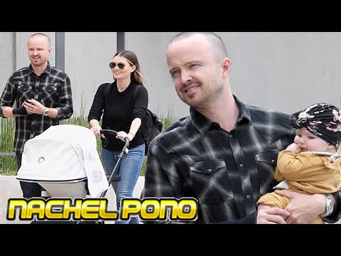 Aaron Paul strolls with wife Lauren and four-month-old daughter Story