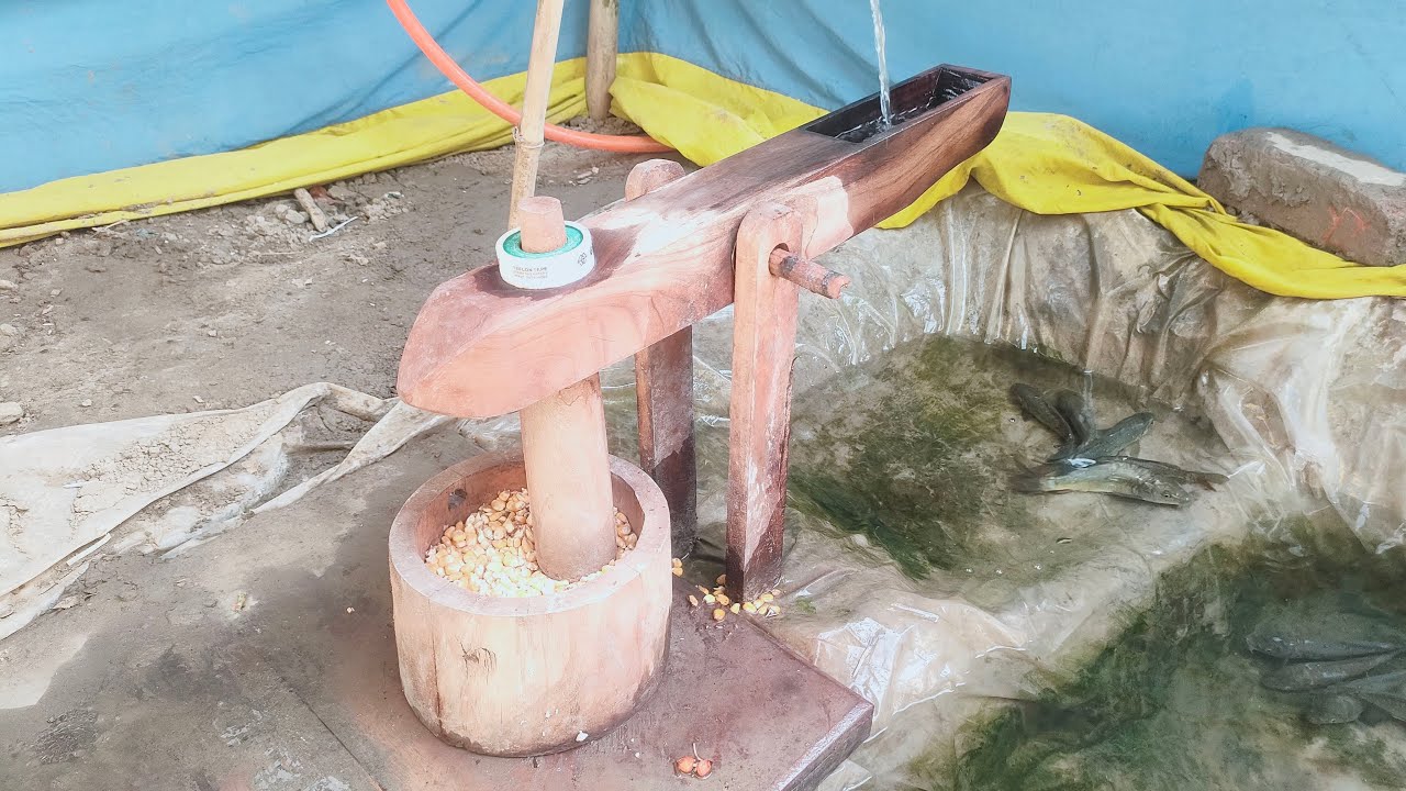 water powered pounder corn mill live