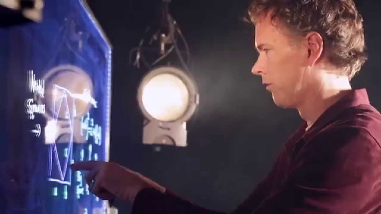 Learning Glass - What is he writing on?