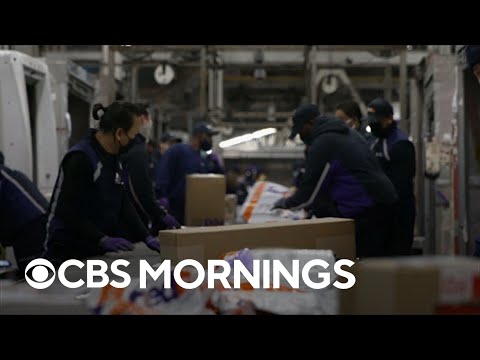Norah O'Donnell gets an exclusive look inside FedEx shipping facility