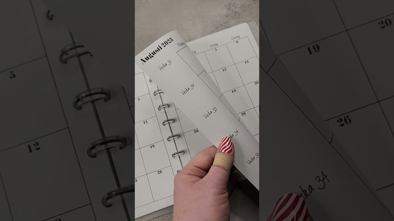 Flipping through the yearly 2023 planner printable