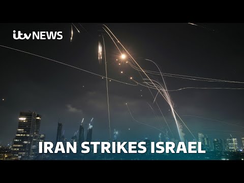 Watch: ITV News reporter looks on as Iran launches retaliatory strikes against Israel | ITV News