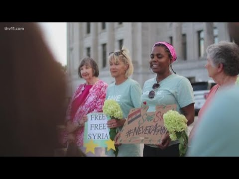 Vigil on steps of Arkansas State Capitol to support Syrian community