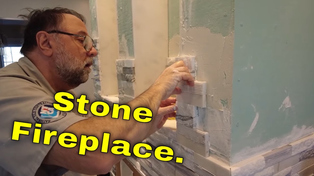 Stacked stone Fireplace. Entire install