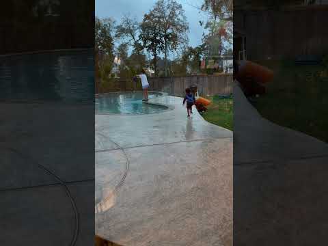 Dad gives son giant lollipop to push mom in the pool #shorts