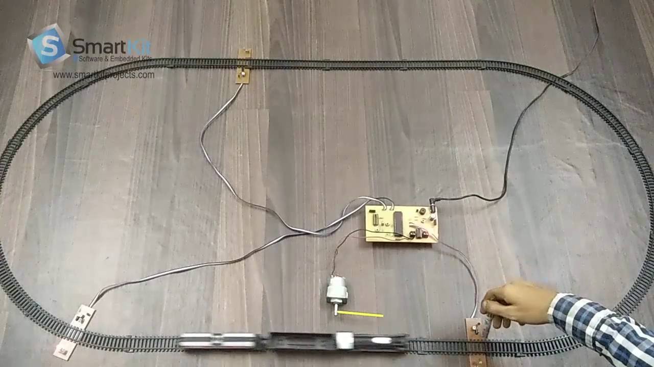 Railway crossing gate control system using 8051 Based Microcontroller