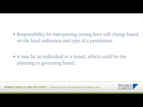 Who is responsible for interpreting zoning laws?